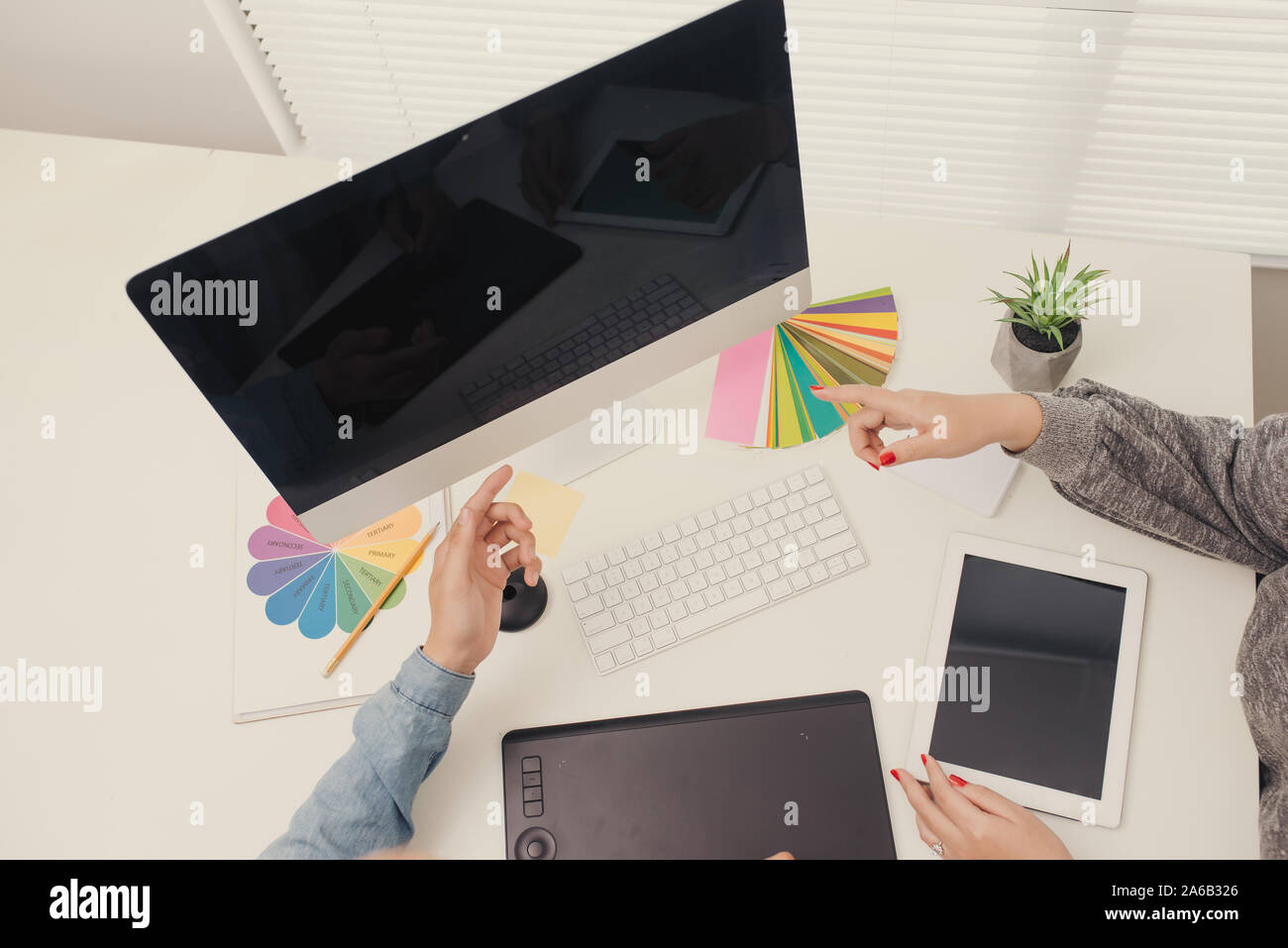 Graphic designer meeting with computer on artist workplace Stock Photo ...