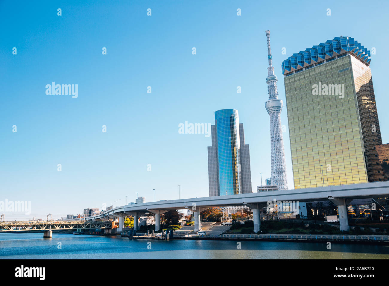 Office building and skytree tower in the sumidagawa river hi-res stock ...