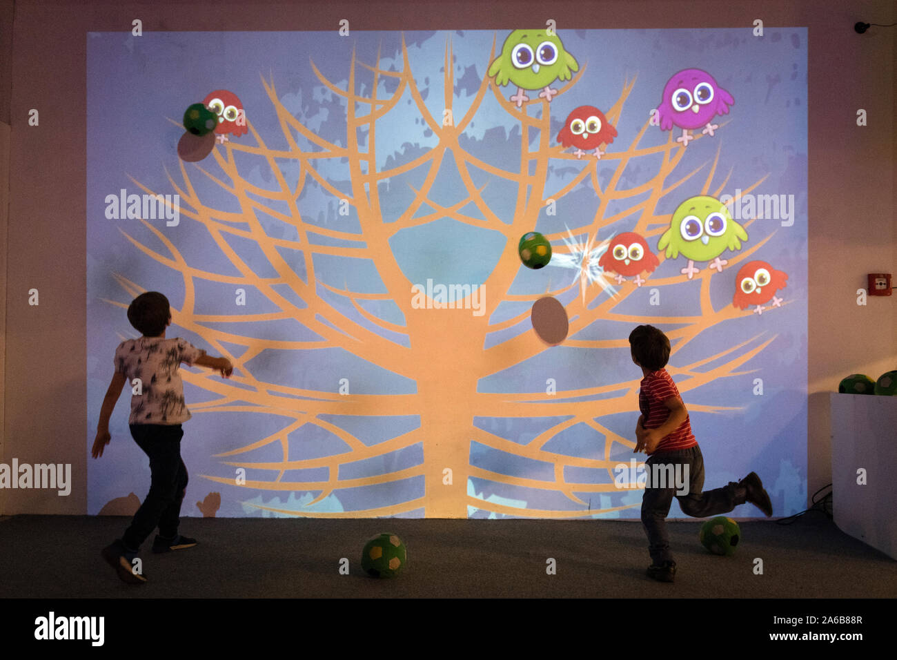 BRATISLAVA, SLOVAKIA - OCT 25, 2019: Kids playing interactive game ...