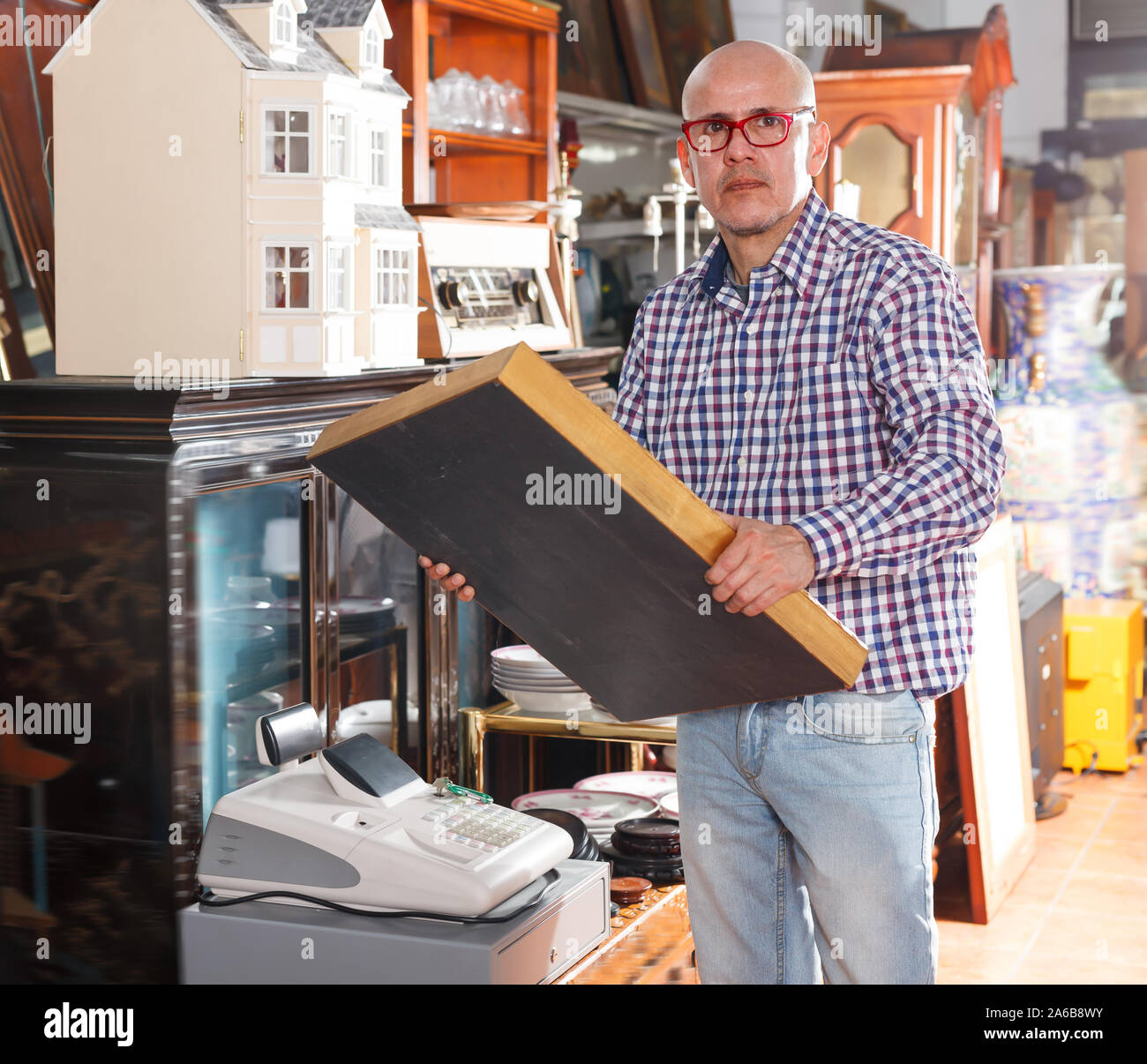 Mature male traveler examining hi-res stock photography and images - Alamy