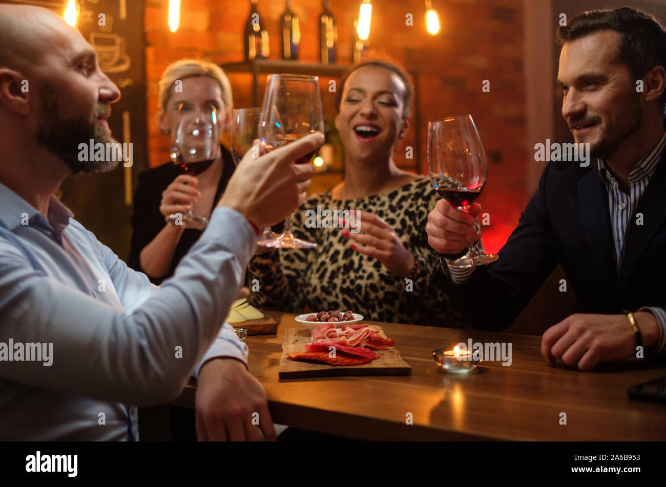 Group of friends having fun talk behind bar counter in a cafe Stock ...