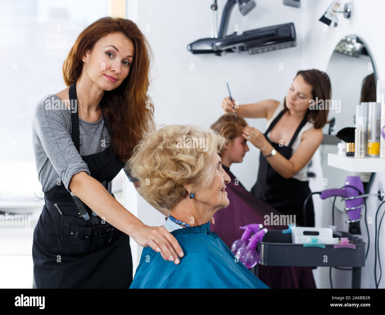 Hairdressing cape hi-res stock photography and images - Alamy