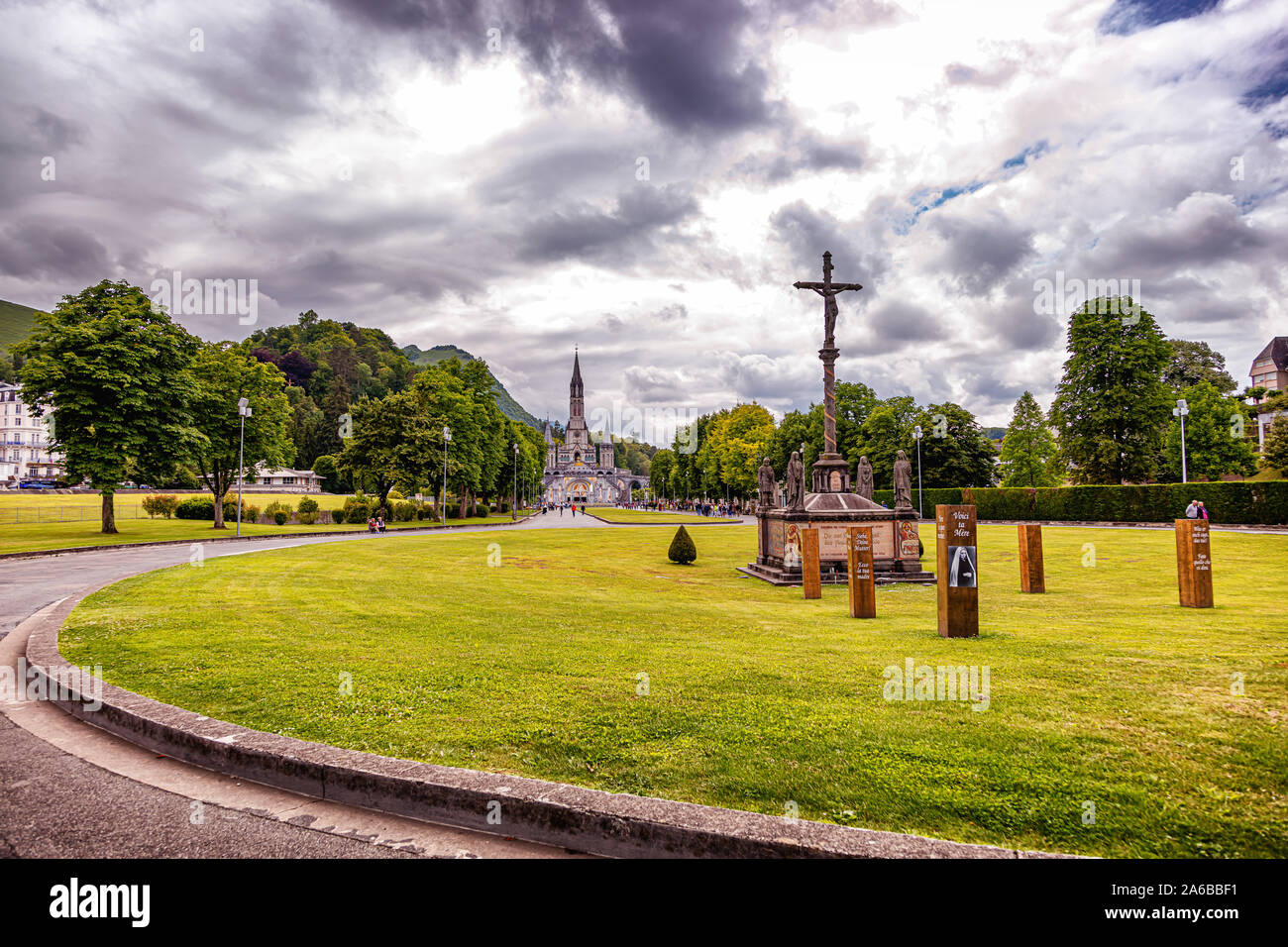 LOURDES - JUNE - 15 - 2019: Christian cross on a background the ...