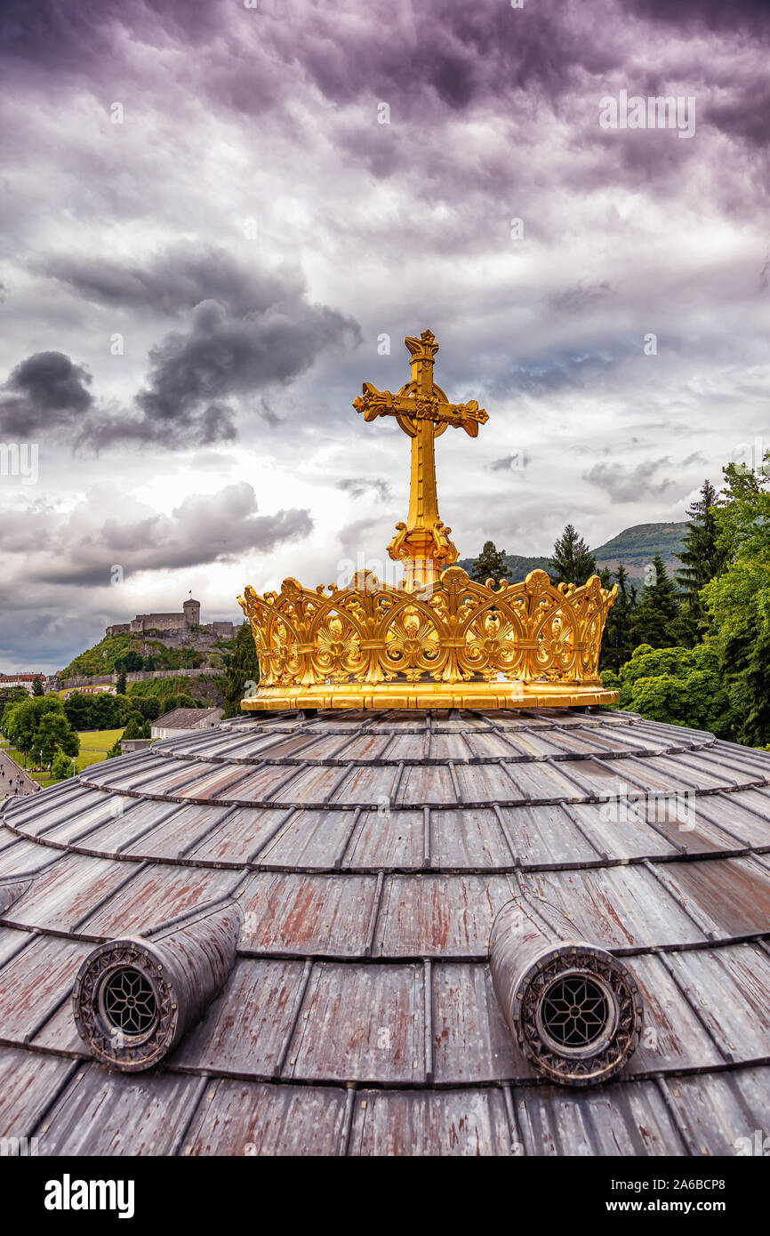 LOURDES - JUNE - 15 - 2019: Christian cross on a background the ...