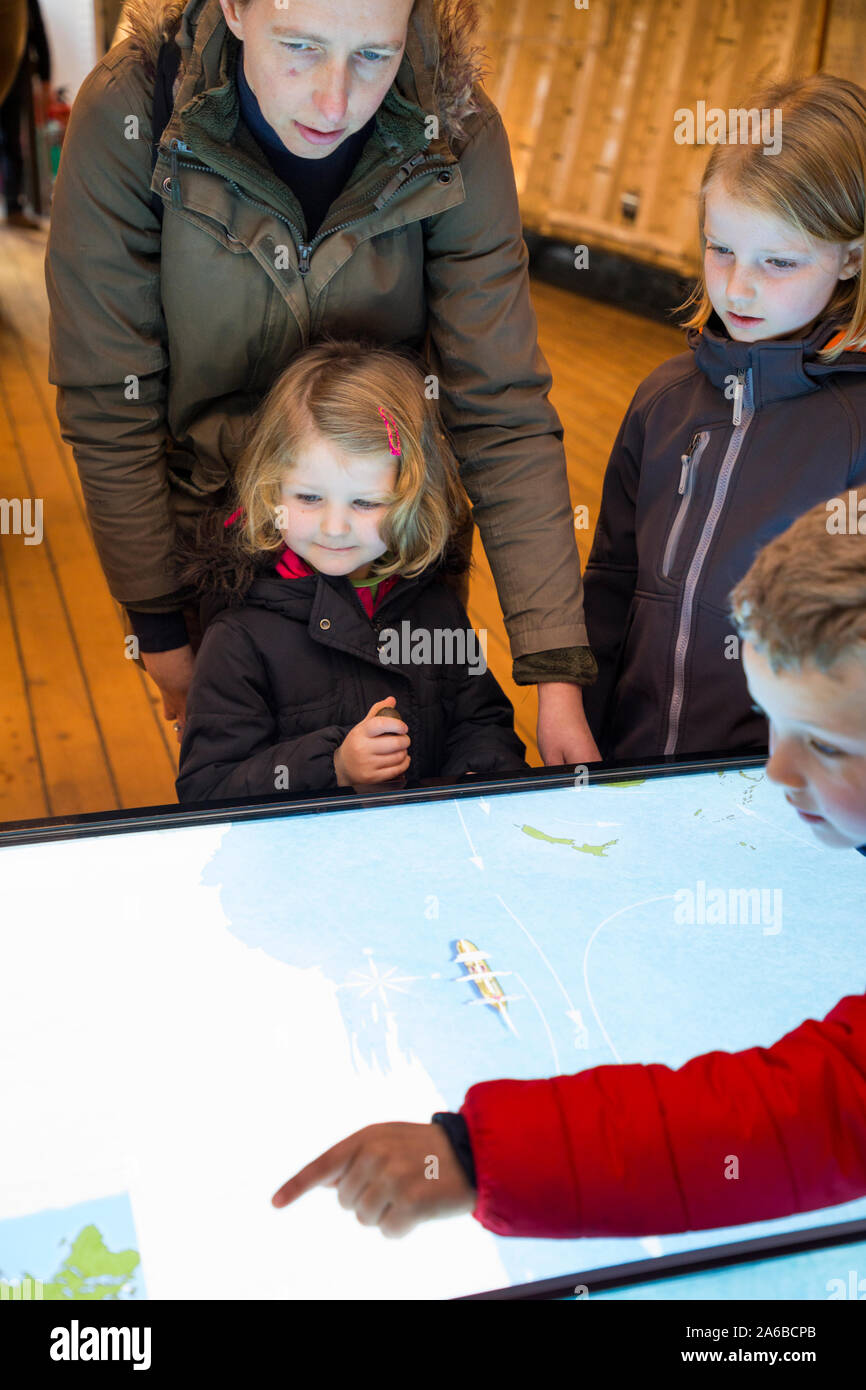 Family and children pore over Captain Woodget's interactive steering ...