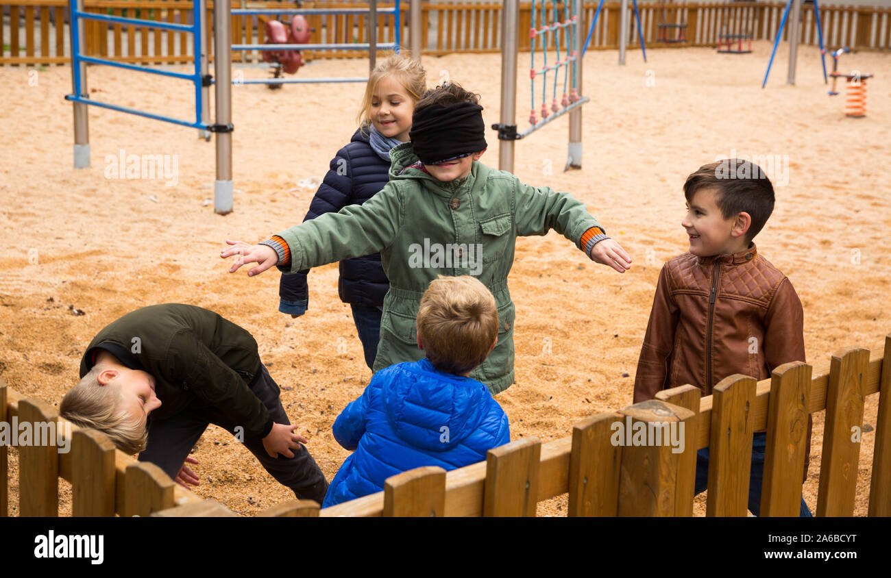 Children play in the blind man's buff Stock Photo - Alamy