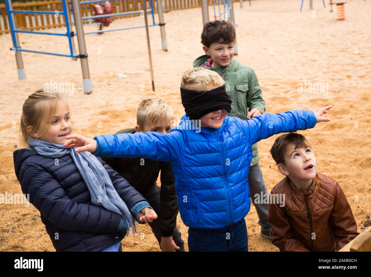 Children play in the blind man's buff Stock Photo - Alamy