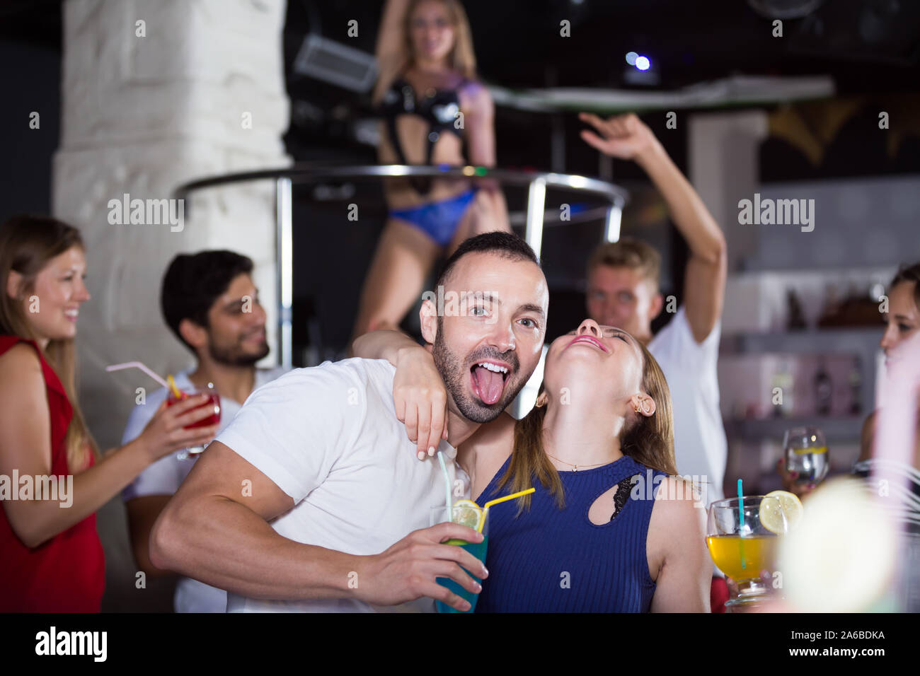 Couple hugging in nightclub hi-res stock photography and images - Alamy