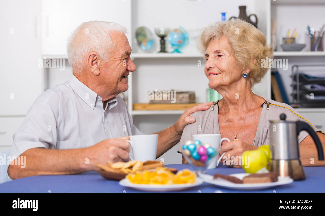 Female friends enjoying tea cookies hi-res stock photography and images ...