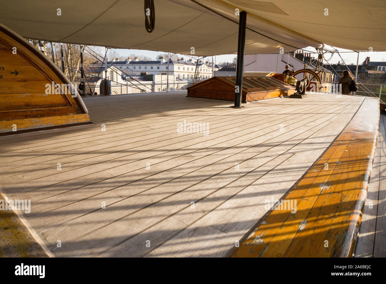 Raised wooden platform (above accommodation) with an awning cover shade ...