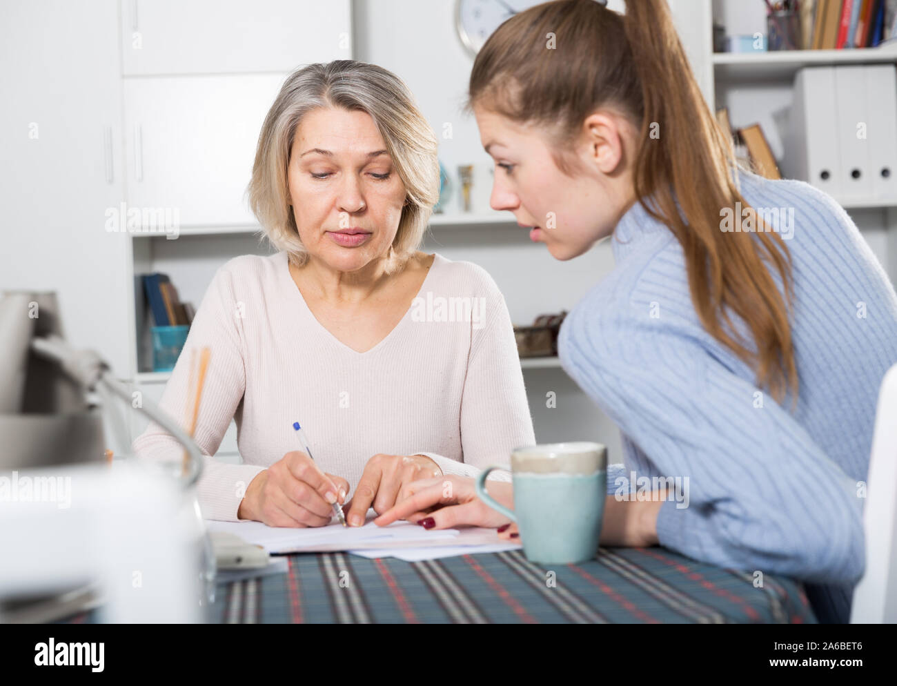 Mature Woman Fills Documents High Resolution Stock Photography and ...