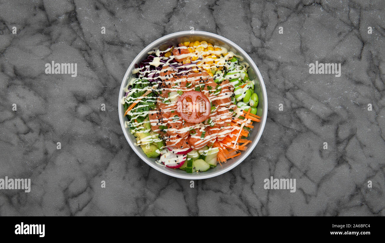 Japanese food. Salmon poke bowl Stock Photo - Alamy