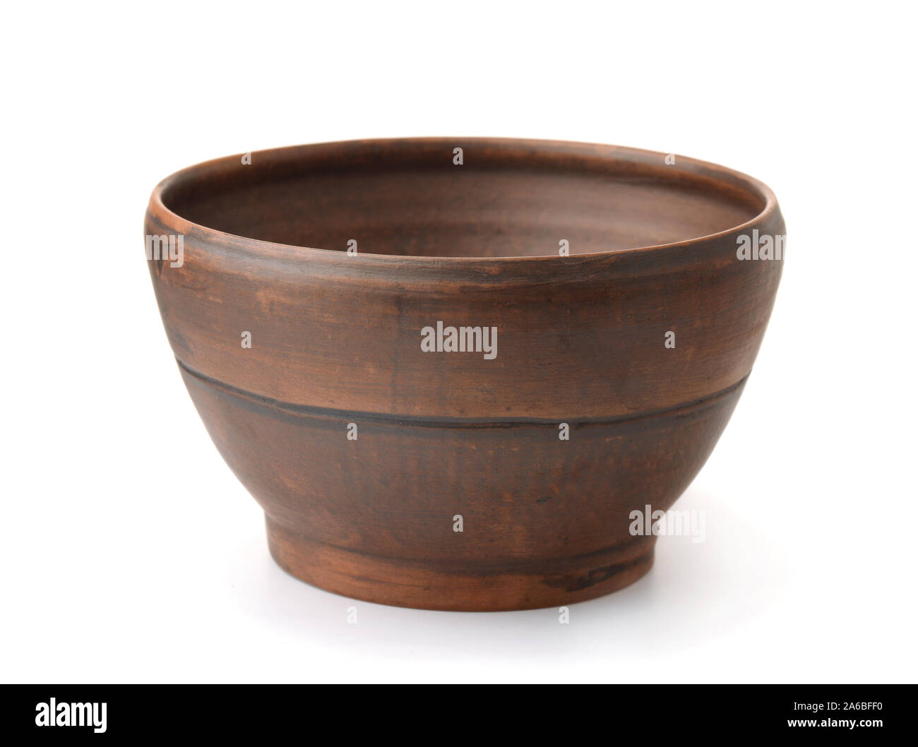 Old rustic clay bowl isolated on white Stock Photo - Alamy