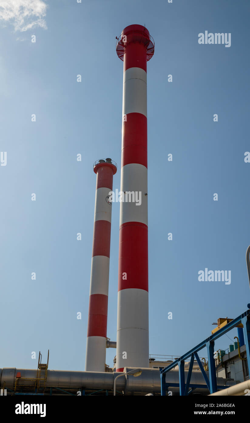 Two industrial chimneys from hi-res stock photography and images - Alamy