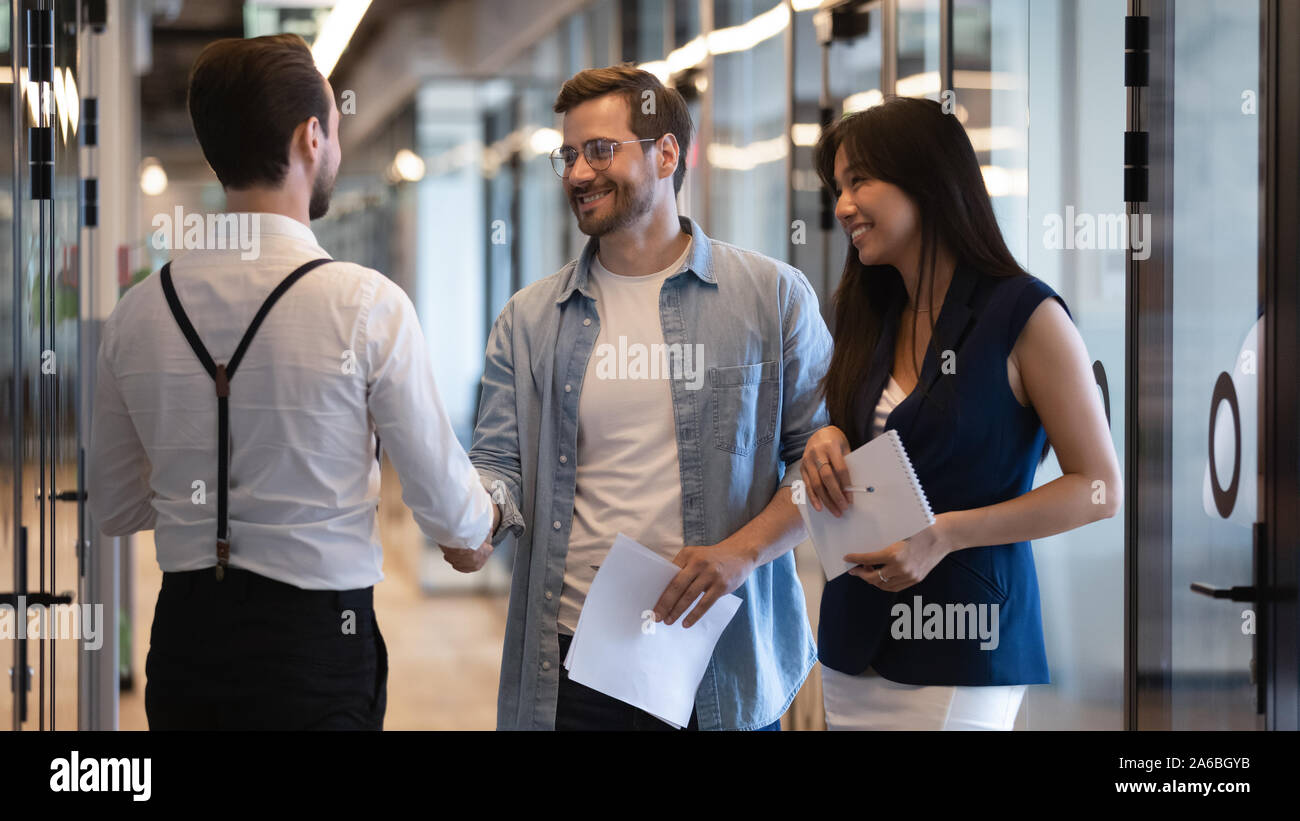 Standing smiling communication greeting hi-res stock photography and ...