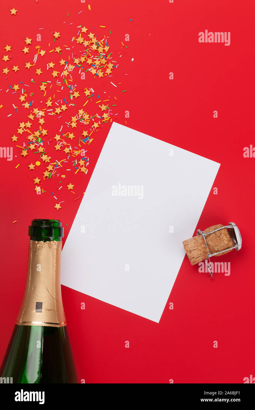 Champagne bottle, blank card and sweets holiday template. Christmas ...