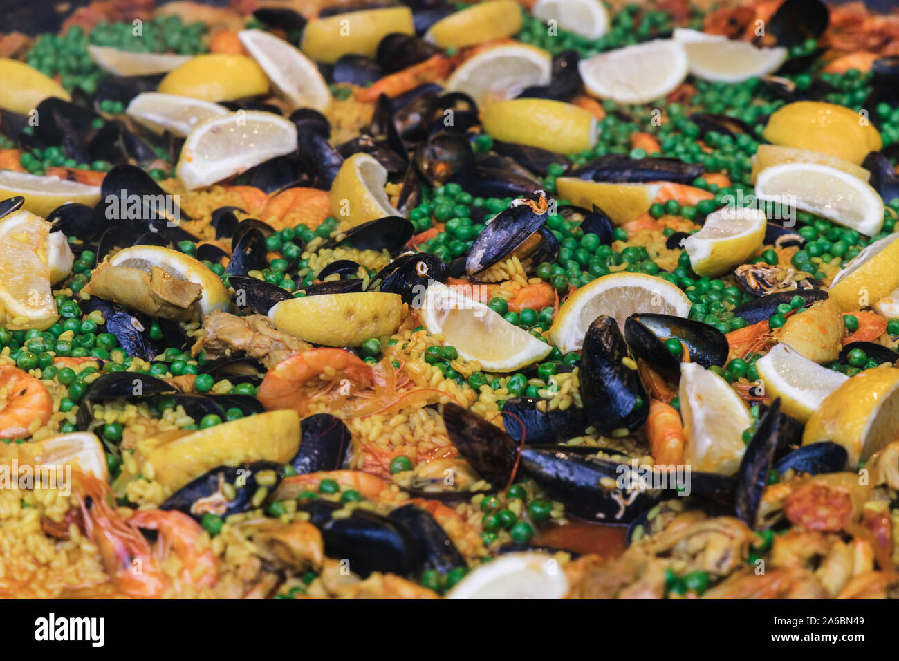 Traditional spanish seafood large paella cooking food background Stock ...