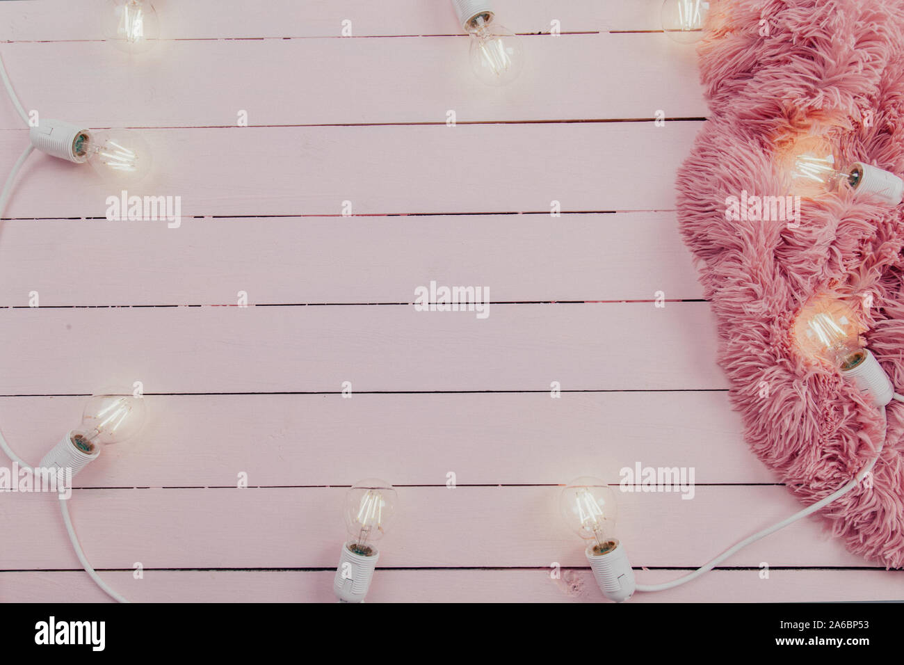 light of white lamps pink boards background Stock Photo - Alamy