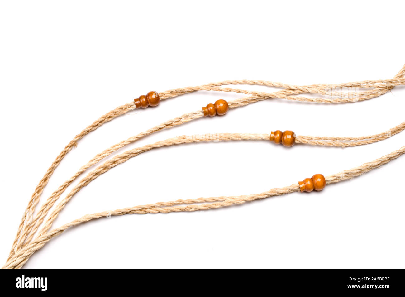 Tangled rope on white background Stock Photo - Alamy