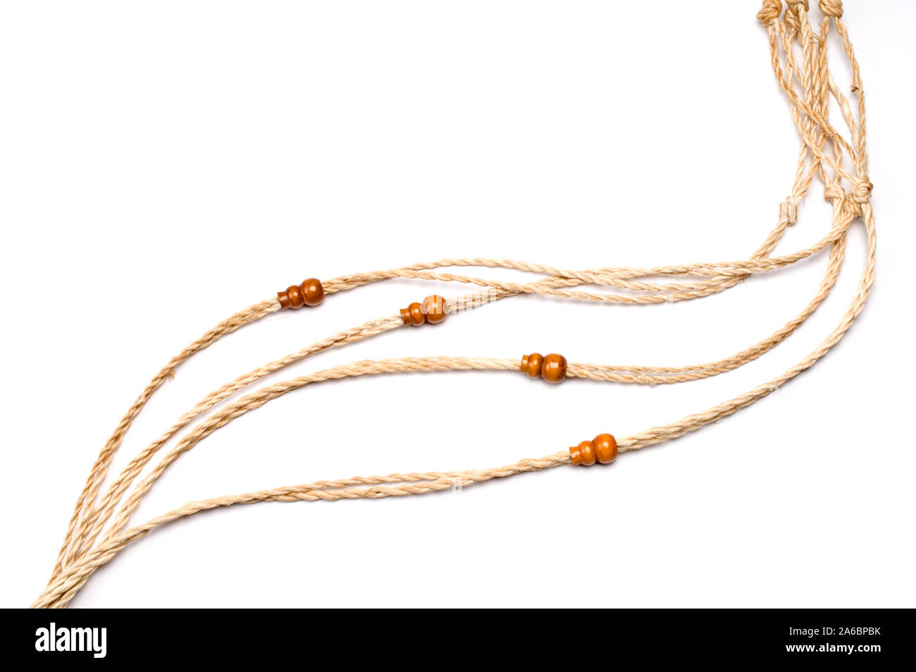 Tangled rope on white background Stock Photo - Alamy