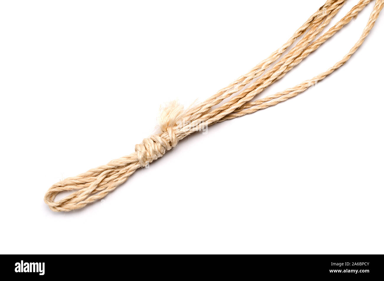 Tangled rope on white background Stock Photo - Alamy