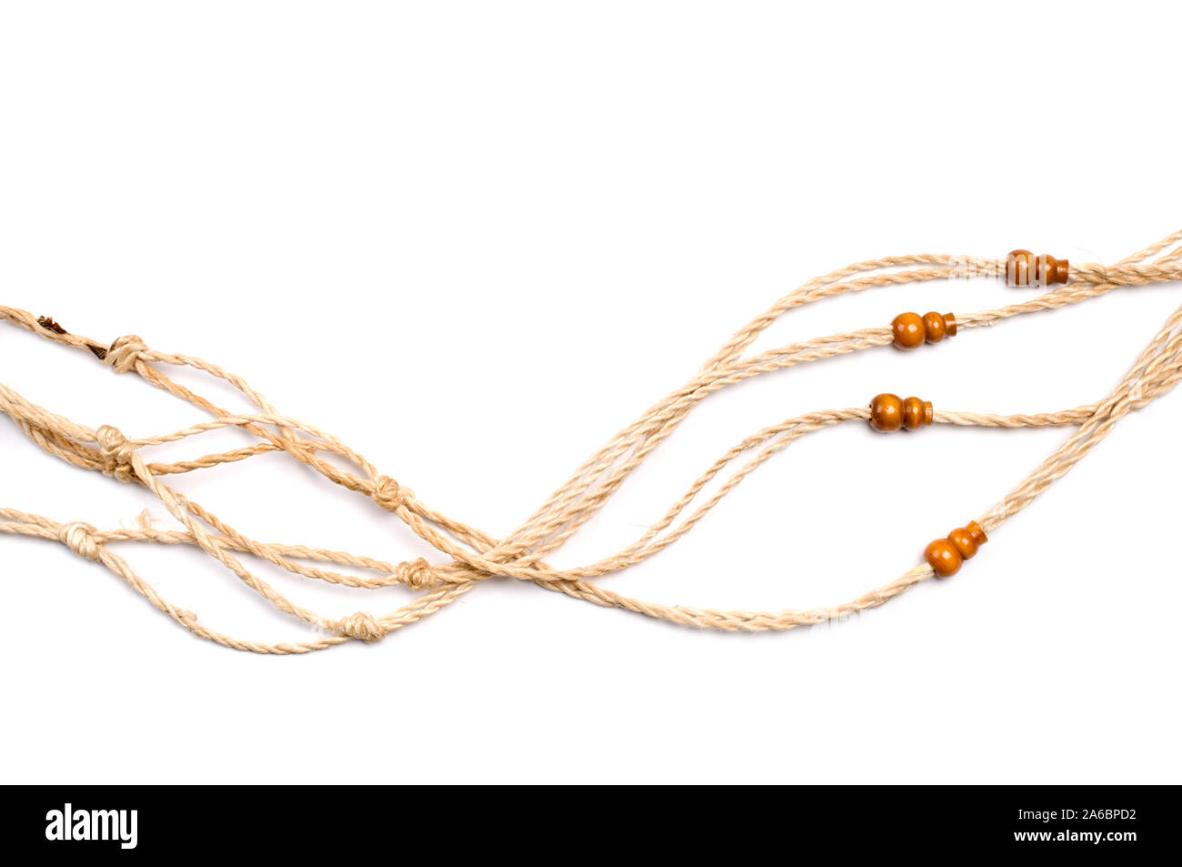 Tangled rope on white background Stock Photo - Alamy