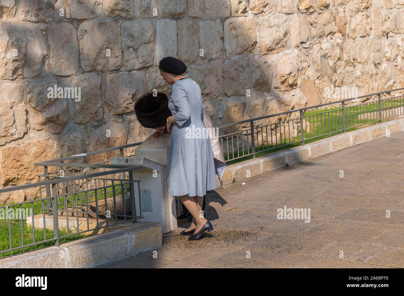 Living in Jerusalem. Everyday life in sacred city of Jerusalem. Mother ...