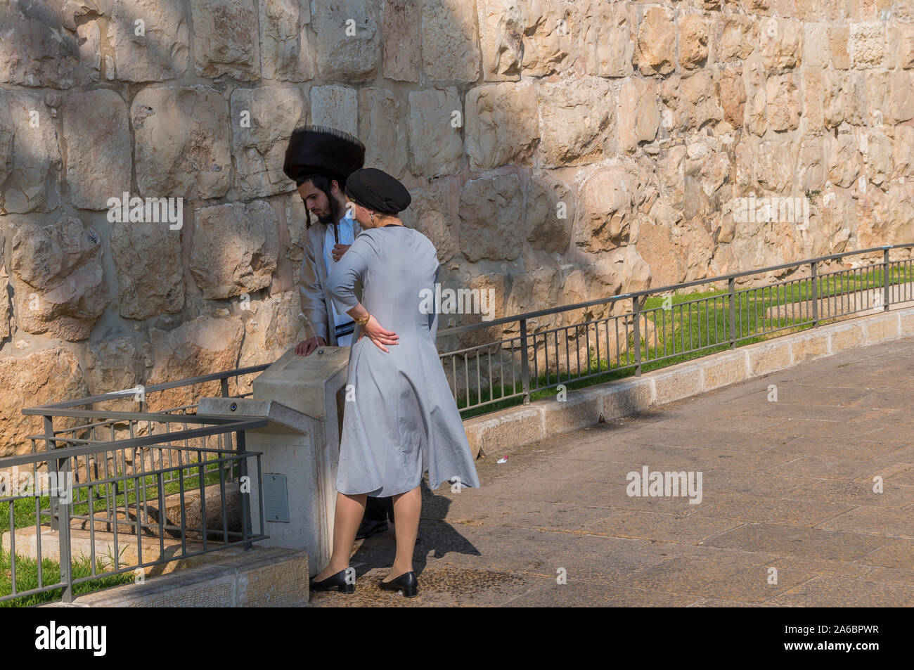 Living in Jerusalem. Everyday life in sacred city of Jerusalem. Mother ...