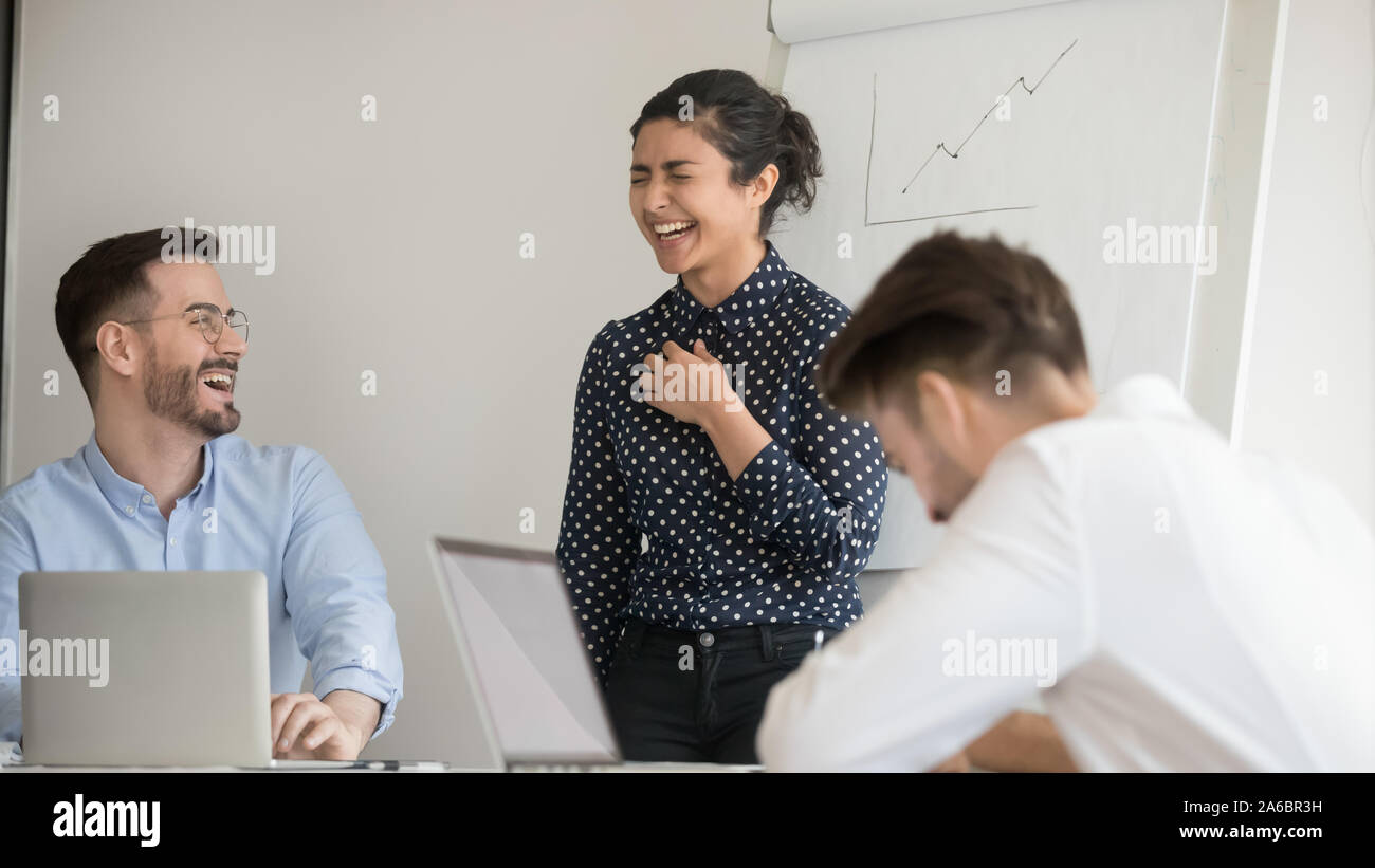 Colleagues laughing, having fun during working process Stock Photo - Alamy