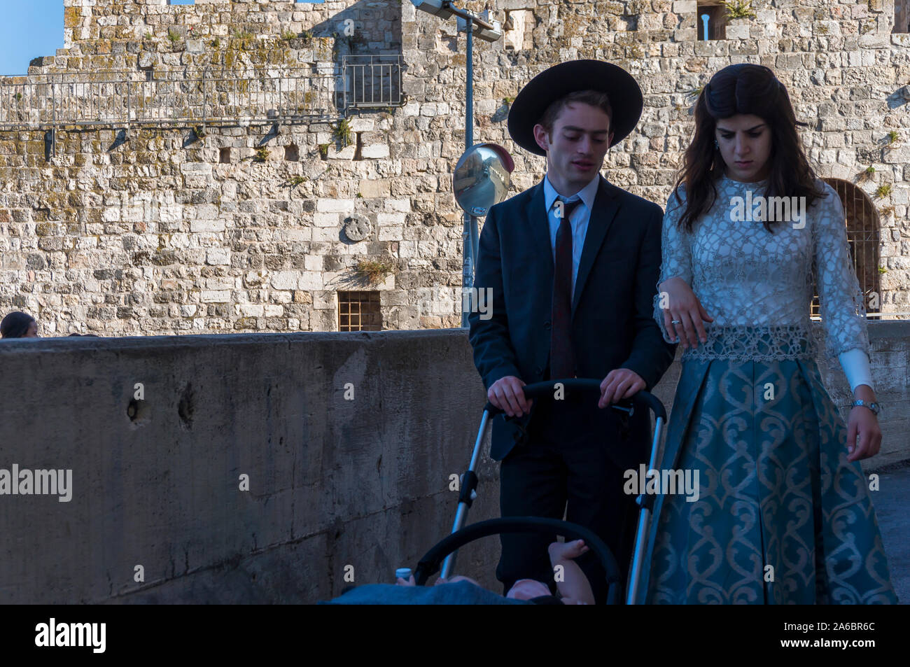 Living in Jerusalem. Everyday life in sacred city of Jerusalem. Mother ...