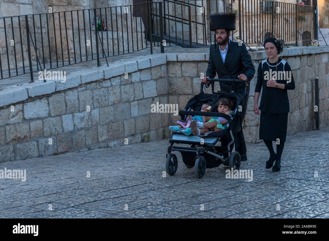 Living in Jerusalem. Everyday life in sacred city of Jerusalem. Mother ...