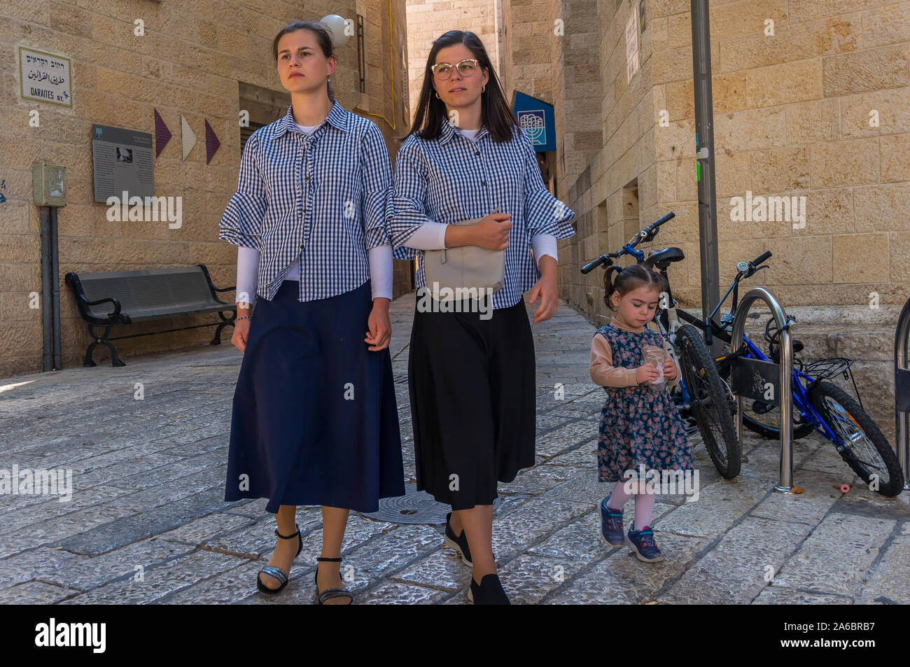 Living in Jerusalem. Everyday life in sacred city of Jerusalem. Mother ...