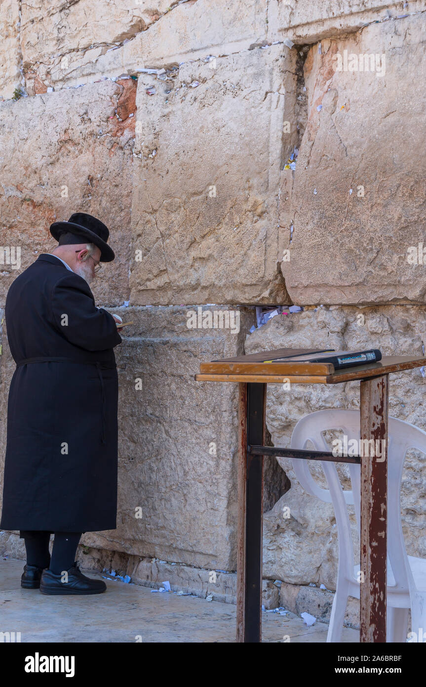 Living in Jerusalem. Everyday life in sacred city of Jerusalem. Mother ...
