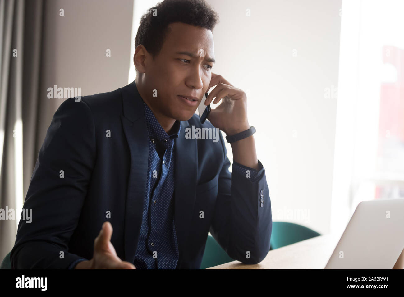Confused angry customer calling hi-res stock photography and images - Alamy