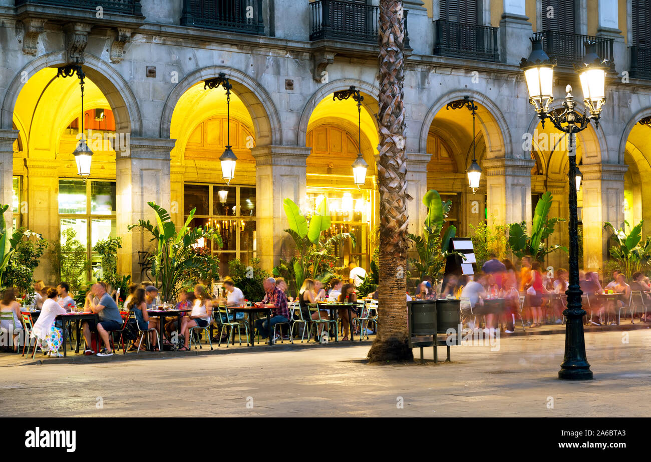 Famous Placa Reial (Royal Square) illuminated at night in Barcelona ...