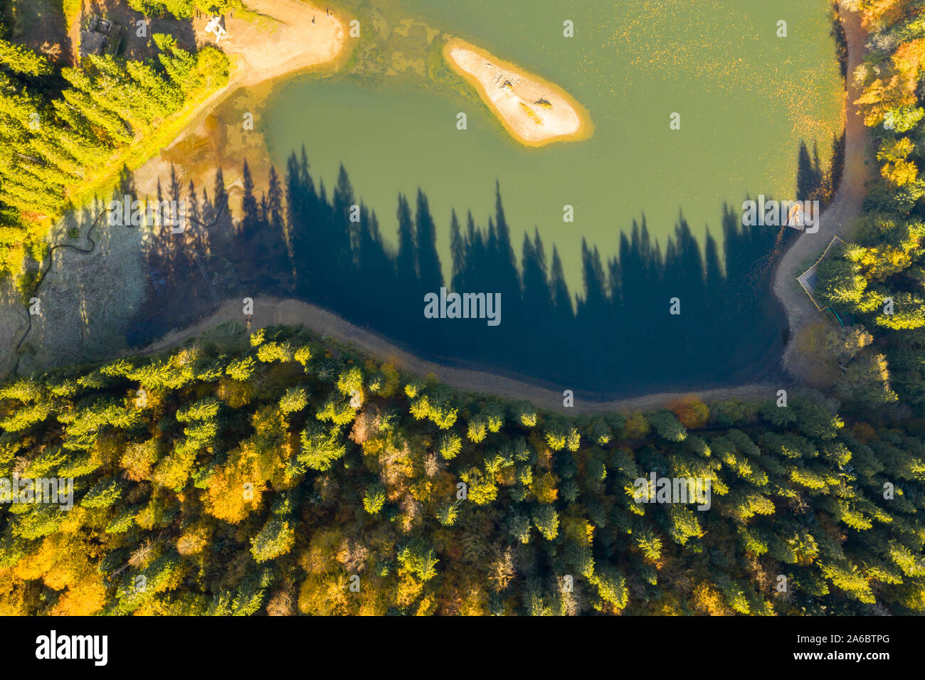 big lake in the middle of mountains during autumn Stock Photo - Alamy