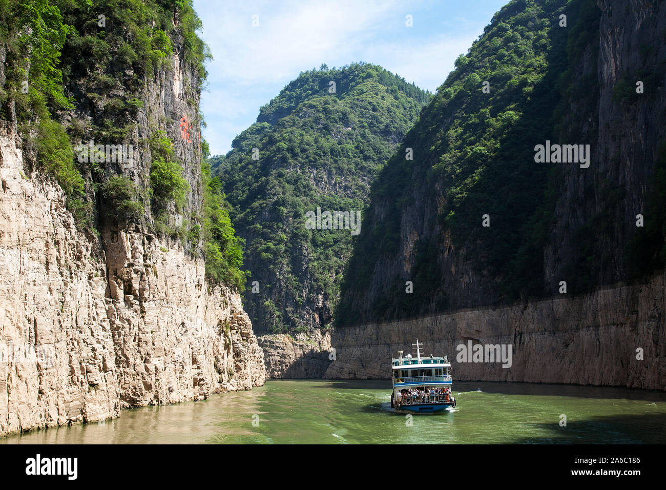 Small tourist boat sailing down China Shennong Stream Yangtze River ...