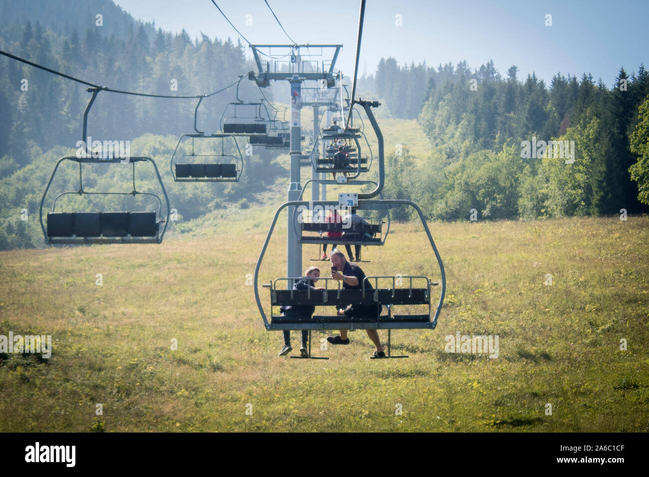 Two chair lift hi-res stock photography and images - Alamy