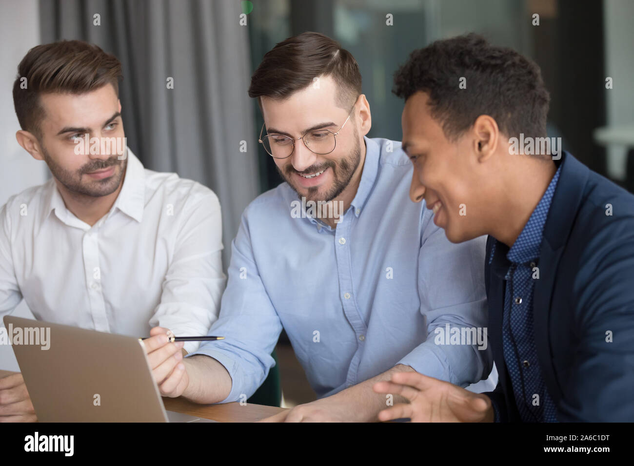 Diverse executive team analyzing hi-res stock photography and images ...