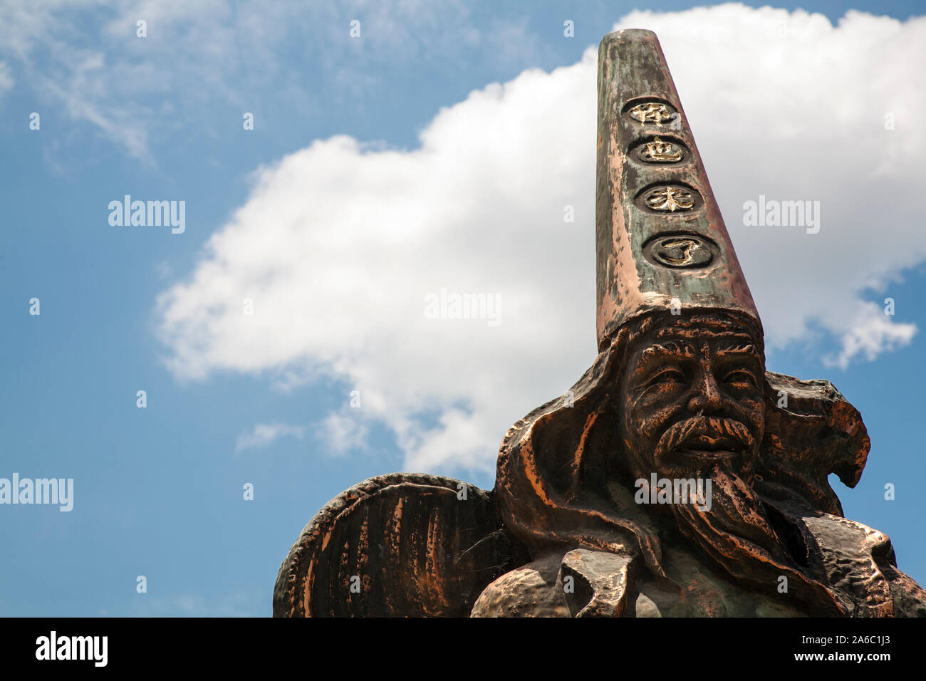 Merlin type wizard bronze sculpture outside entrance of Ghost City of ...