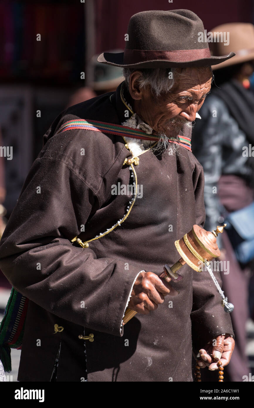A Tibetan Buddhist pilgrim from the Kham region of eastern Tibet ...