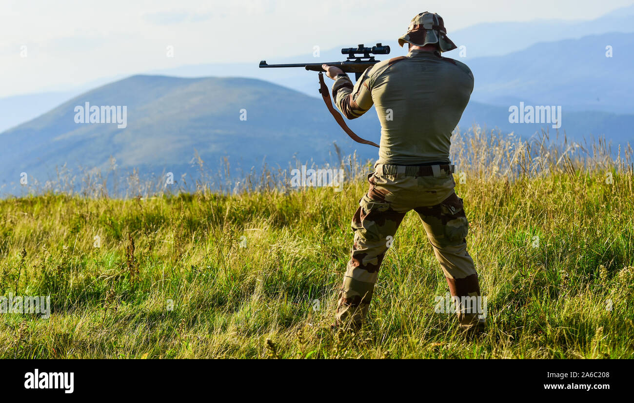 Nice shot. Army forces. Man military clothes with weapon. Brutal ...