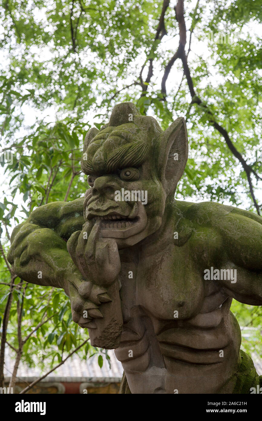 Stone demon statues carvings in Ghost City of Fengdu China Stock Photo ...
