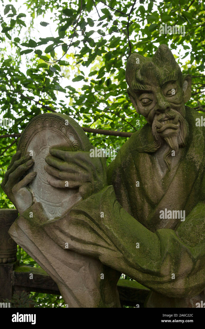 Stone demon statues carvings in Ghost City of Fengdu China Stock Photo ...