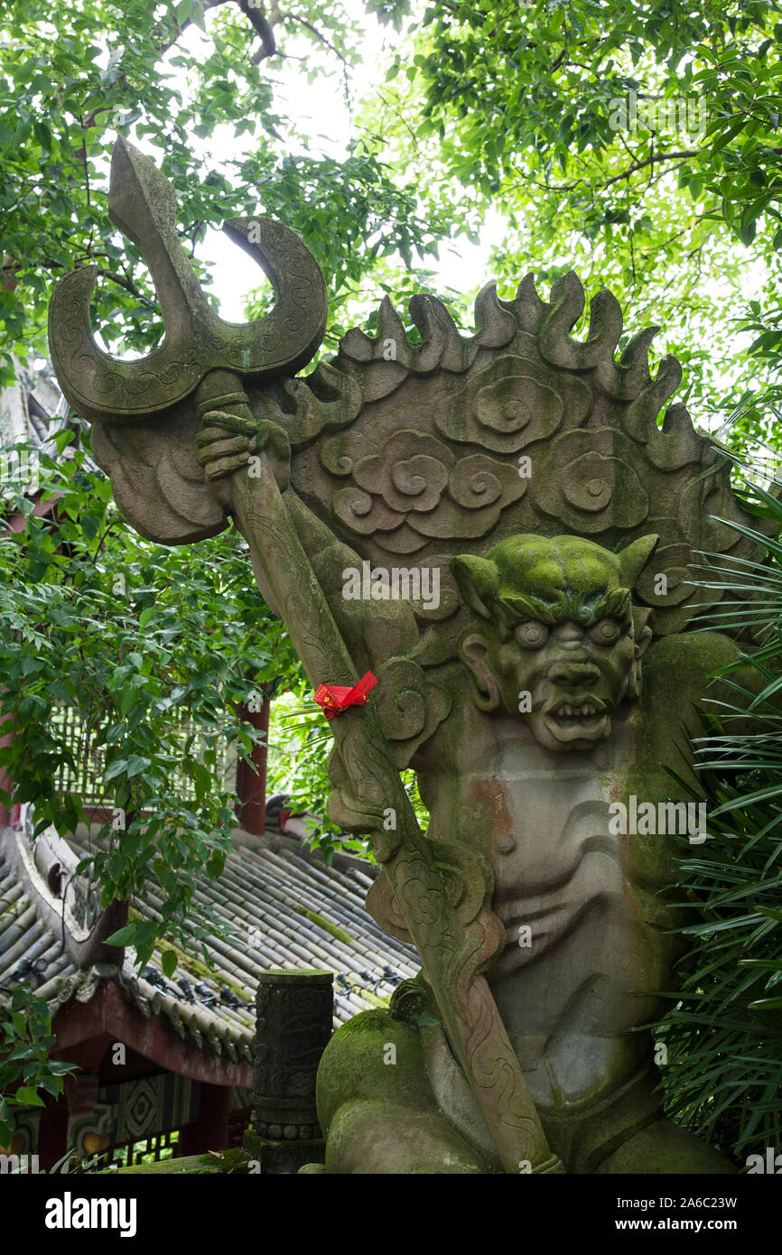 Stone demon statues carvings in Ghost City of Fengdu China Stock Photo ...