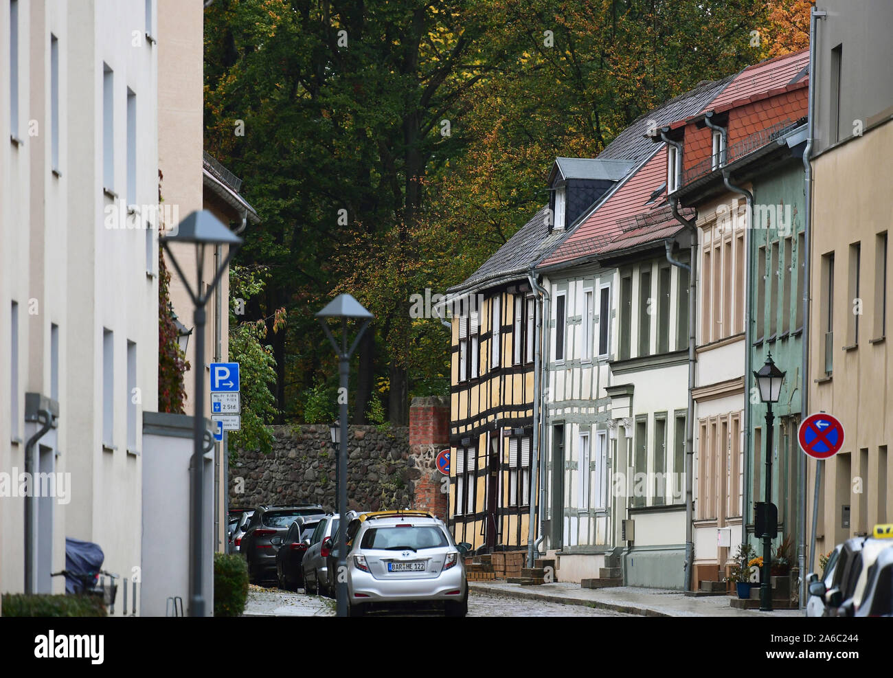 Bernau, Germany. 16th Oct, 2019. Cars park inside the city wall next to ...