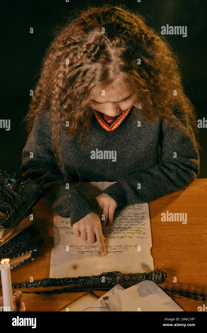 Portrait of a pretty little charmer with magnificent long brown hair ...