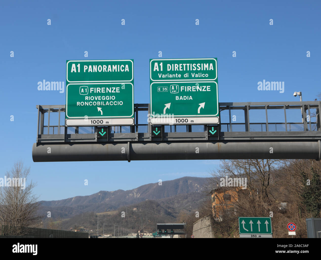 traffic sign on italian highway with text that means direct road to ...