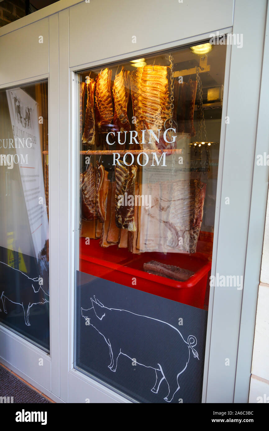 Meat hanging in a curing room, England, UK Stock Photo - Alamy