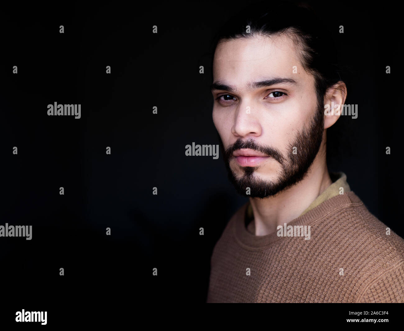 Handsome young Colombian man Stock Photo - Alamy